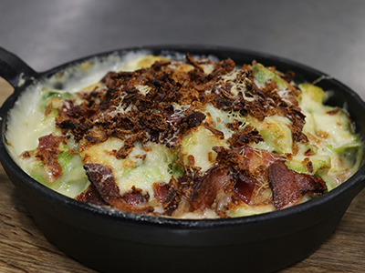 Sprouts baked with cheese sauce and bacon crumb - Bidfood