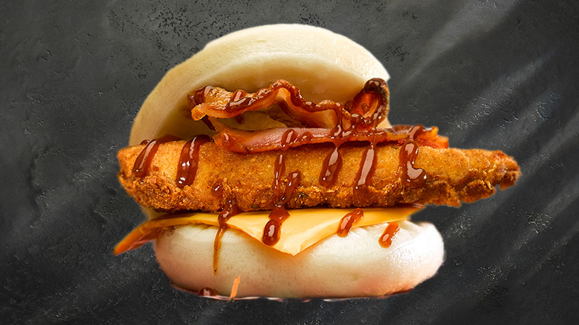 American barbecue crispy chicken, cheese, bacon and pickle bao bun ...